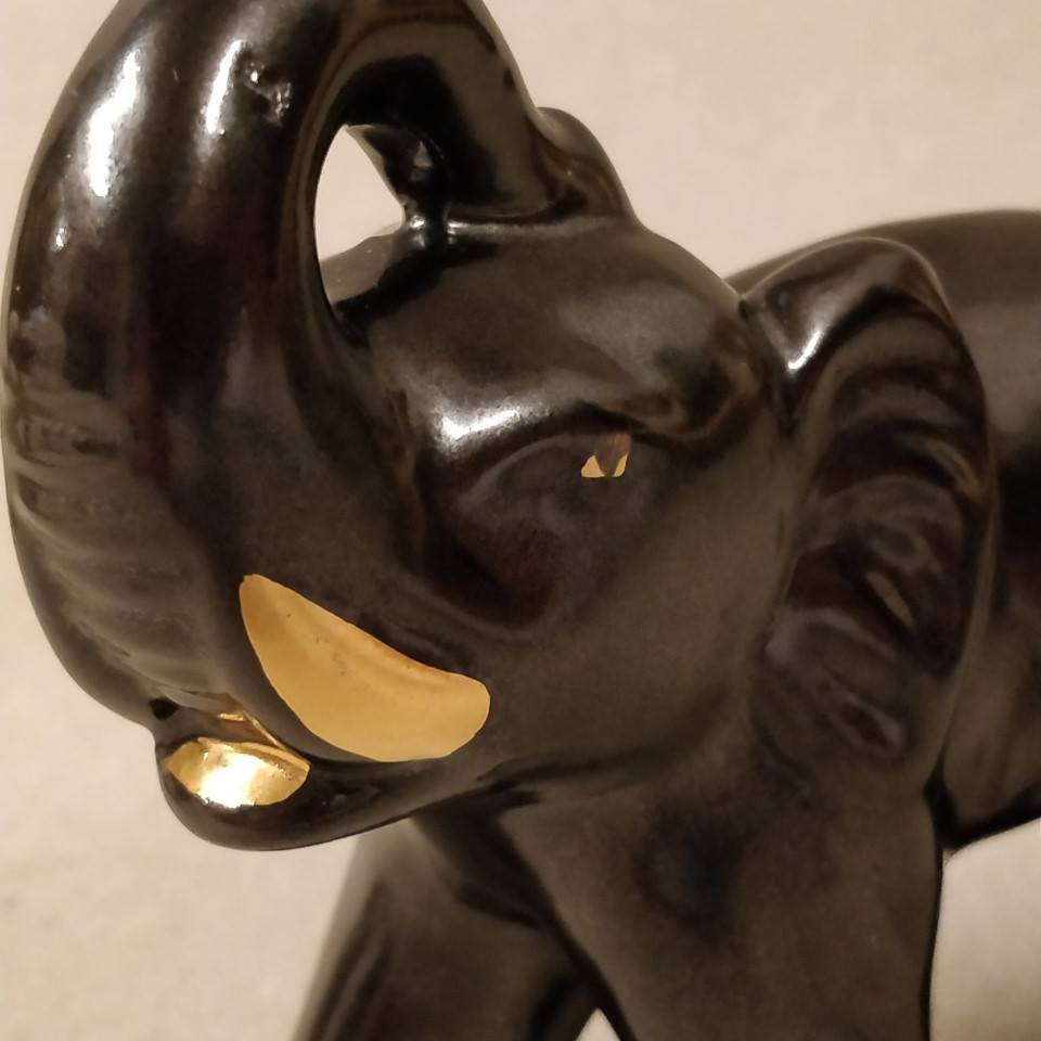 Sort keramik elefant, gammel skulptur. Online shopping.
