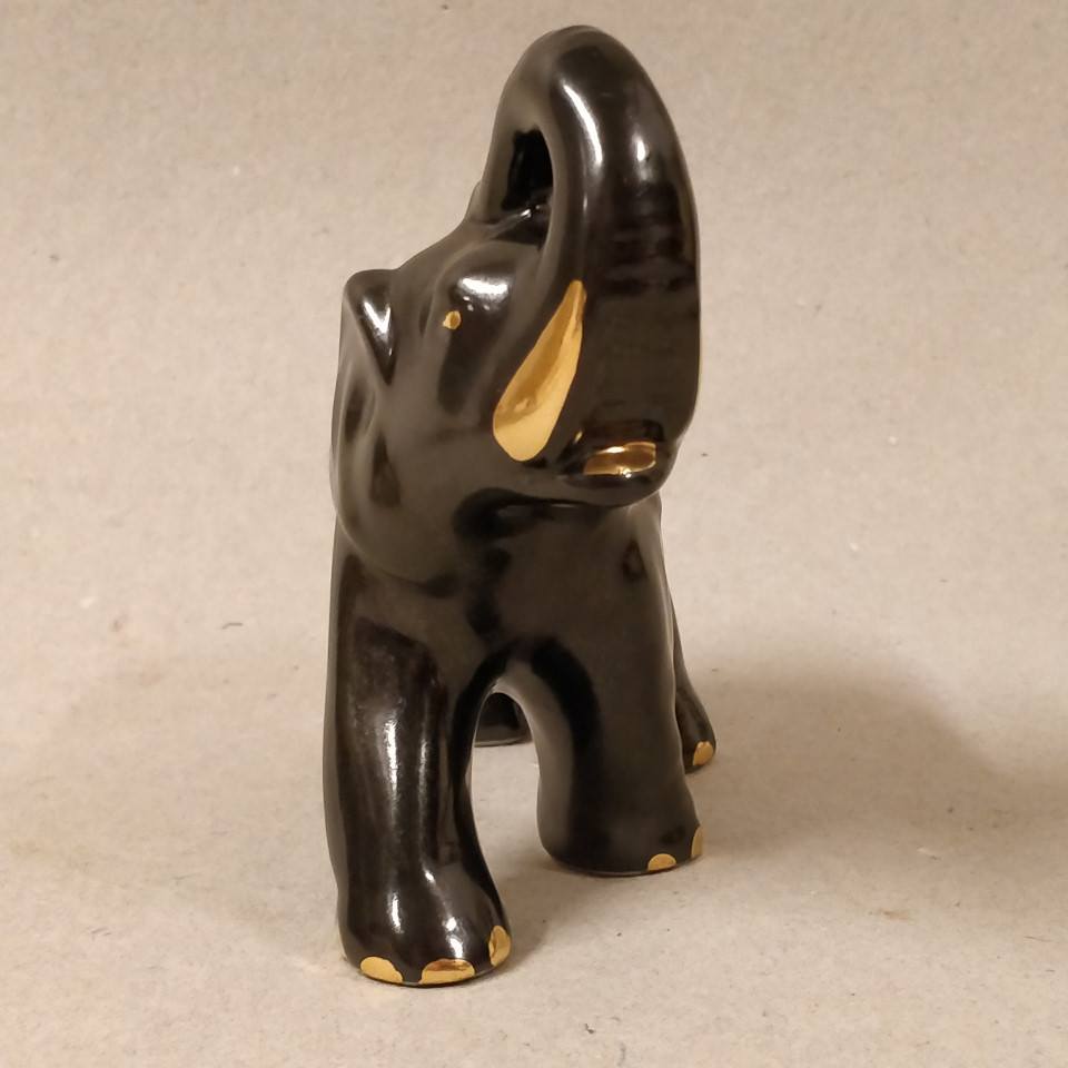 Sort keramik elefant, gammel skulptur. Online shopping.